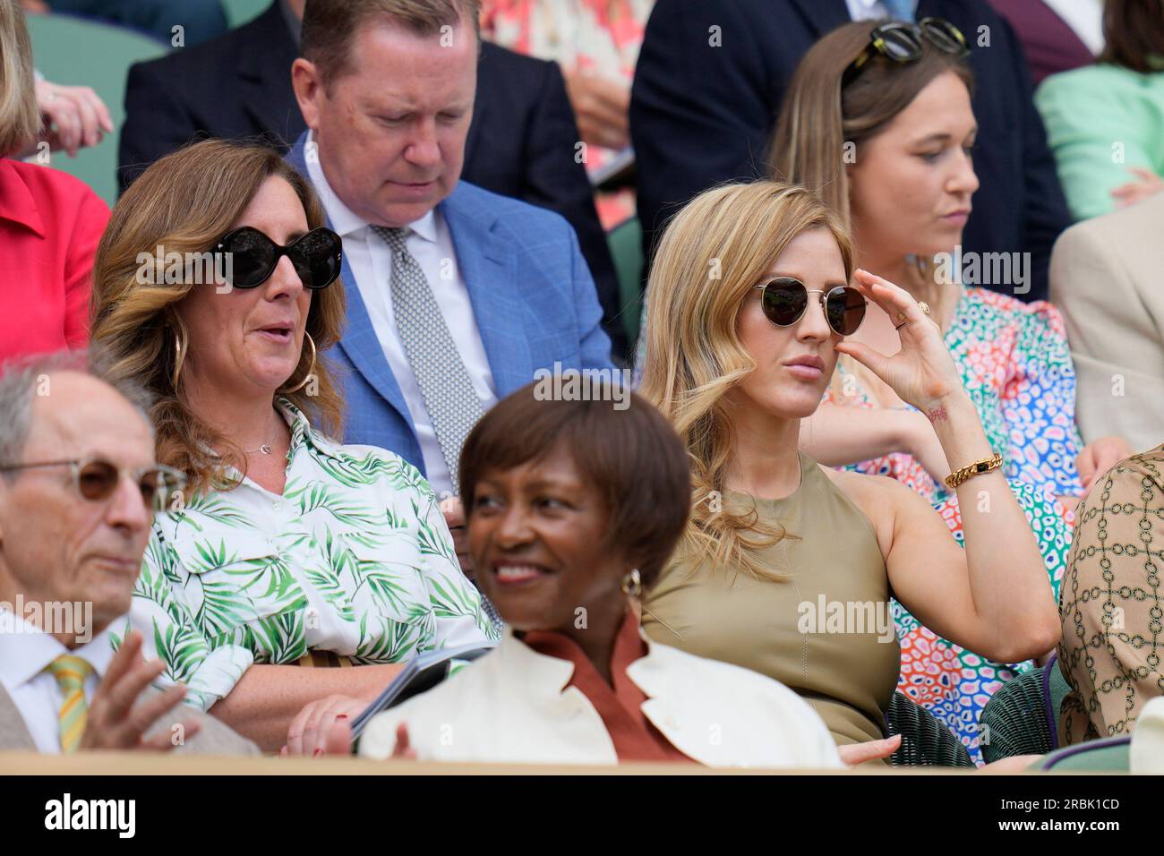 Singer, Ellie Goulding adjusts her sunglasses as she sits in the Royal ...
