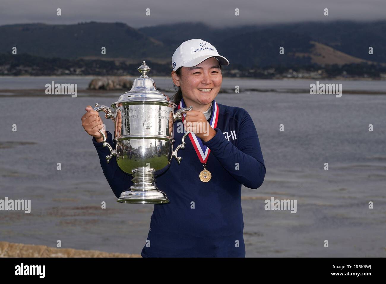 Allisen Corpuz poses with the winner's trophy after the U.S. Women's Open golf tournament at the ...