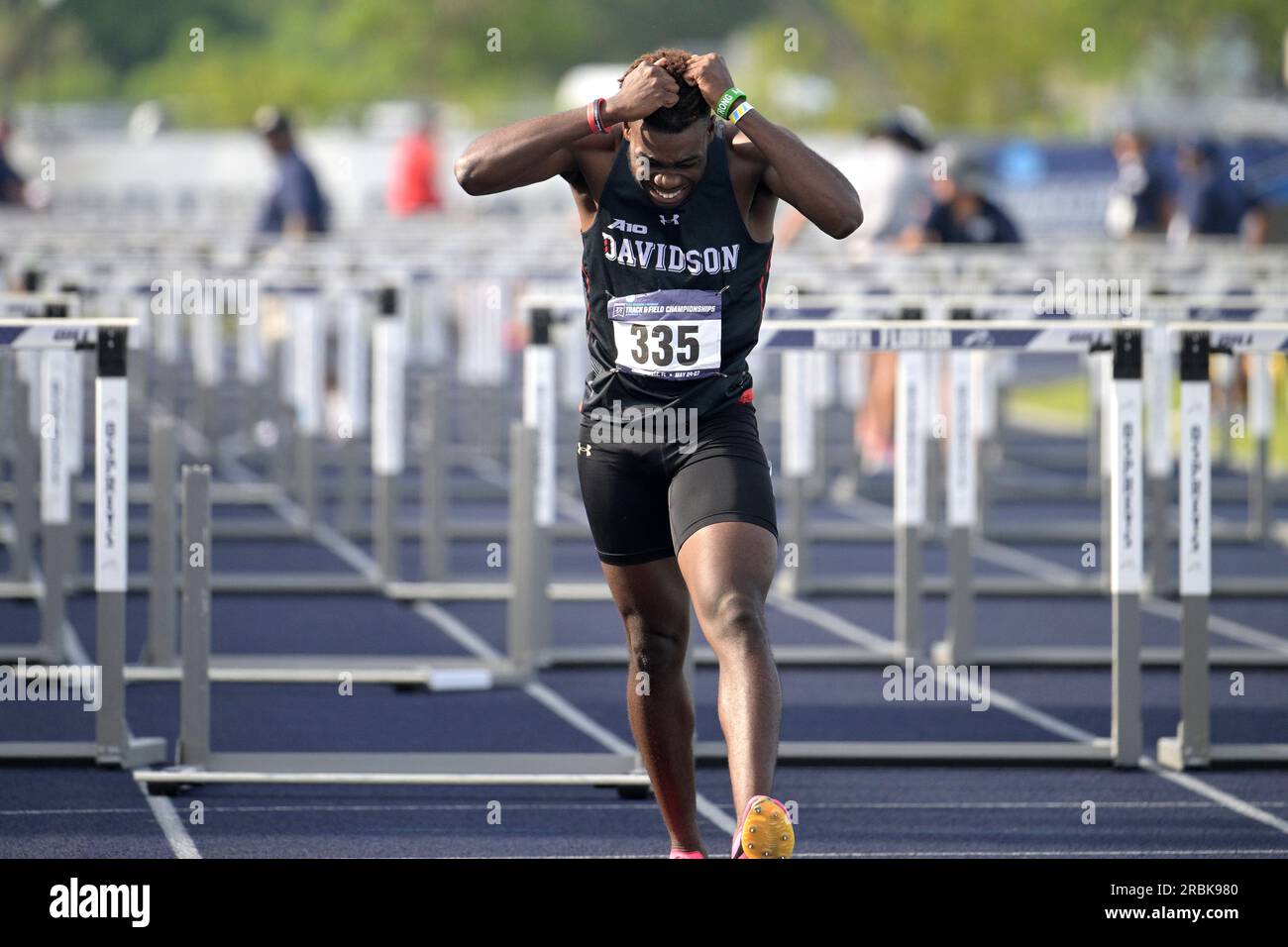 Davidson's Jayden Smith reacts after competing in the men's 110 meter ...