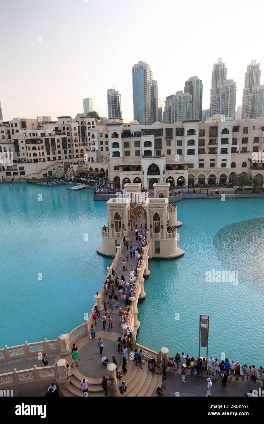 UAE, Dubai, Burj Dubai, Souk Al Bahar and the Burj Khalifa lake at sunset Stock Photo - Alamy