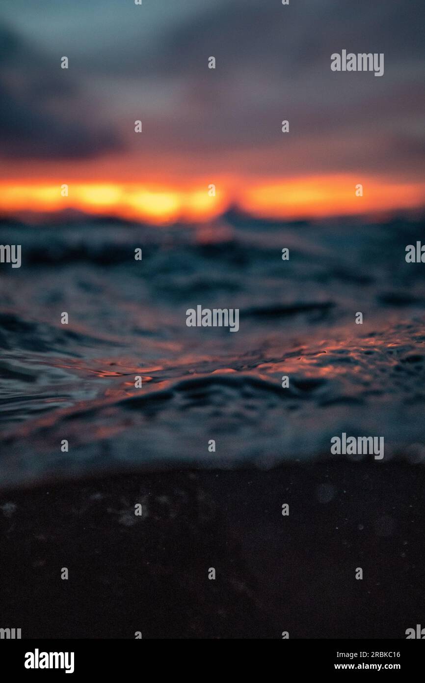 Fire in the Sky from the water at Sandys Beach in Oahu, Hawaii Stock ...