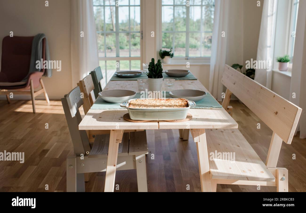 prepared food and dinner table ready for a family dinner Stock Photo ...