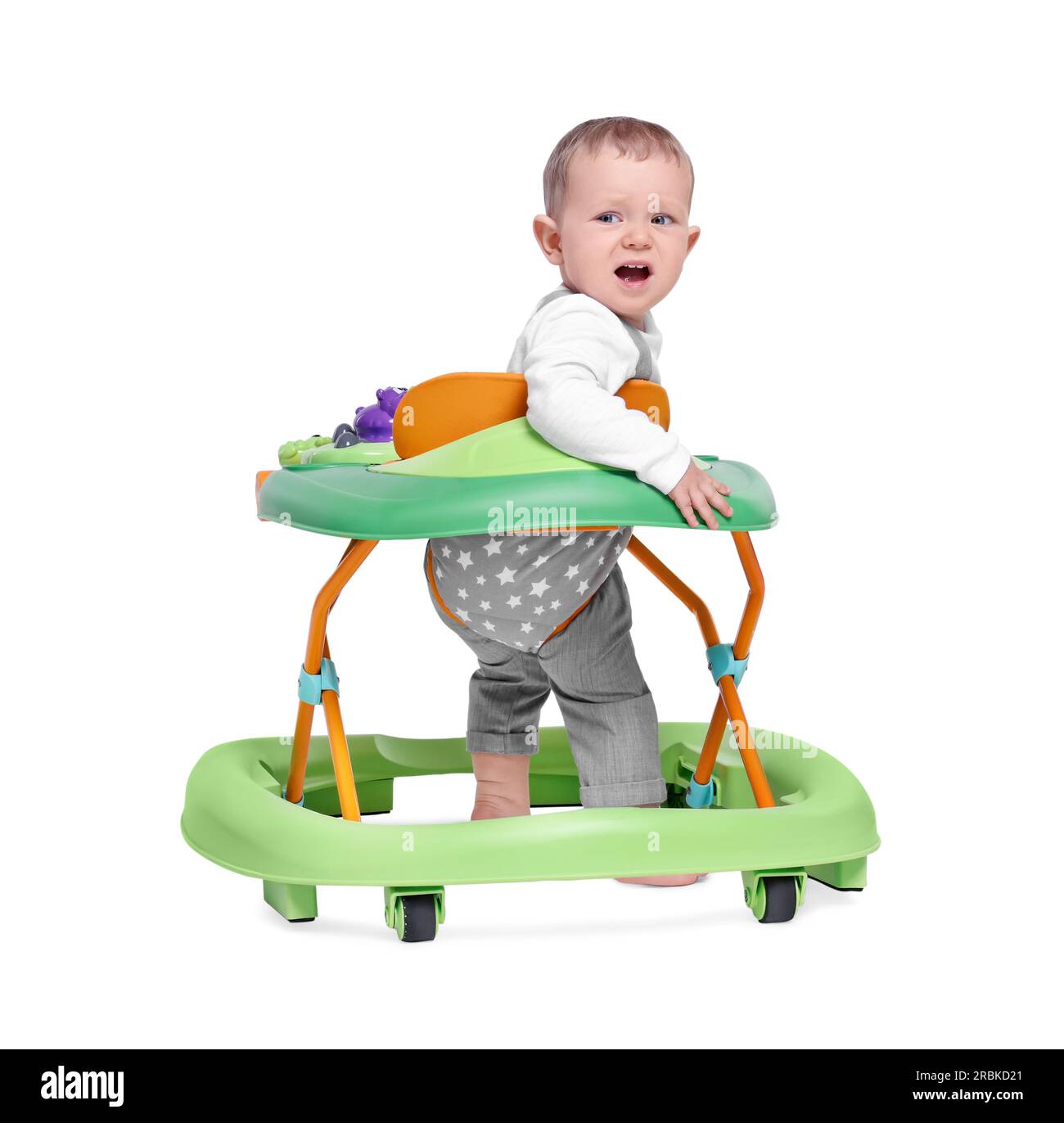 Cute little boy in baby walker on white background Stock Photo - Alamy