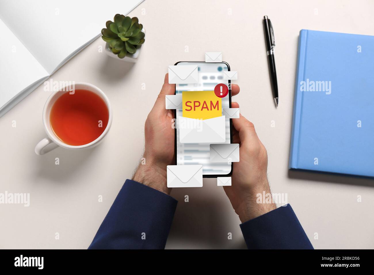 Spam warning message, envelope illustrations popping out of device ...