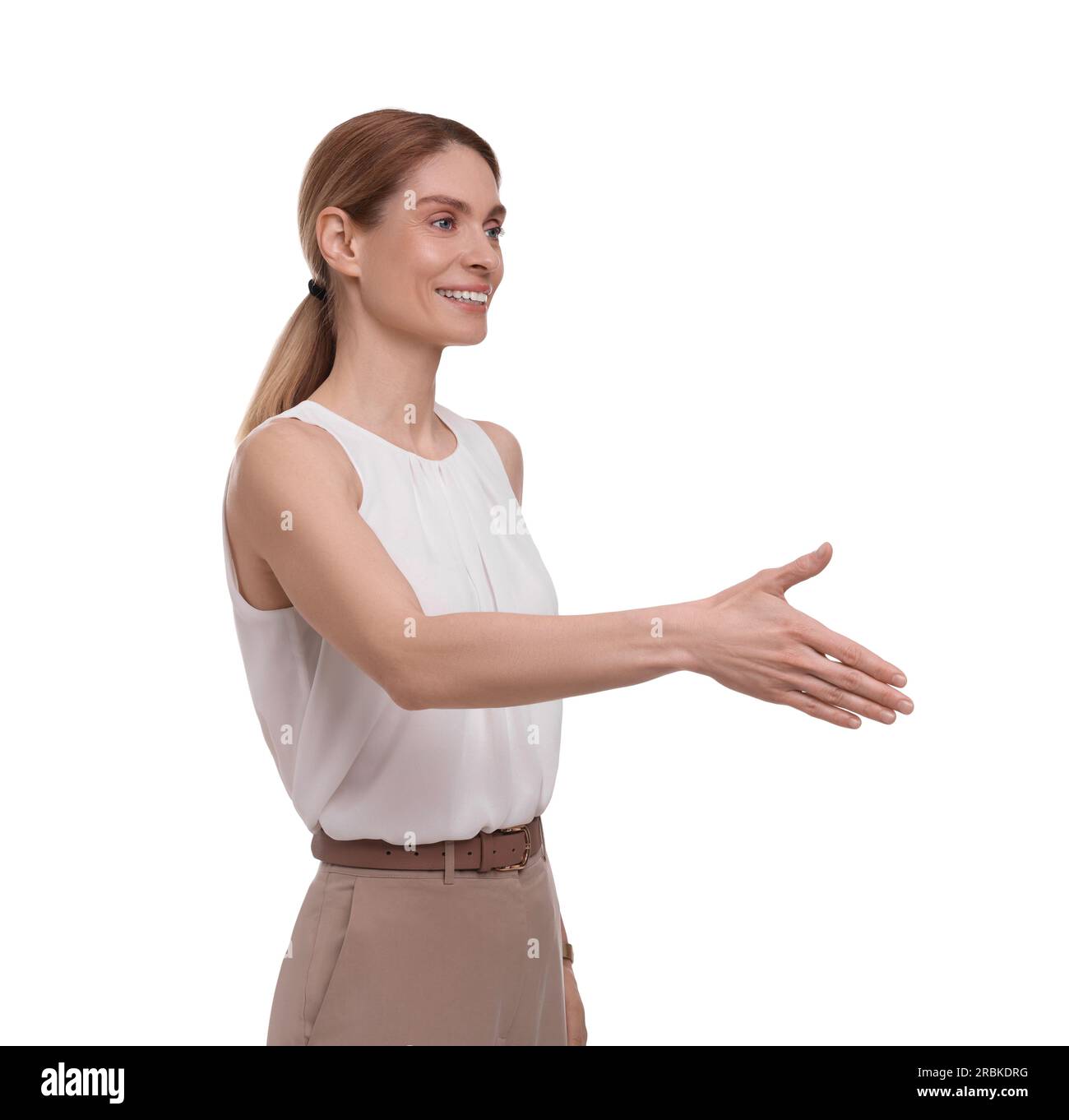 Beautiful happy businesswoman giving handshake on white background ...