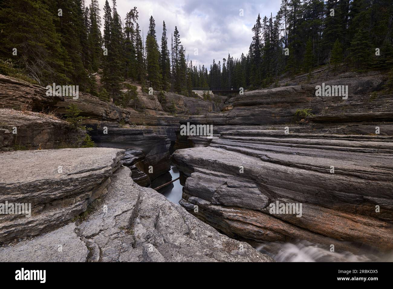 The Mistaya River flows through Mistaya Canyon in Banff National Park ...
