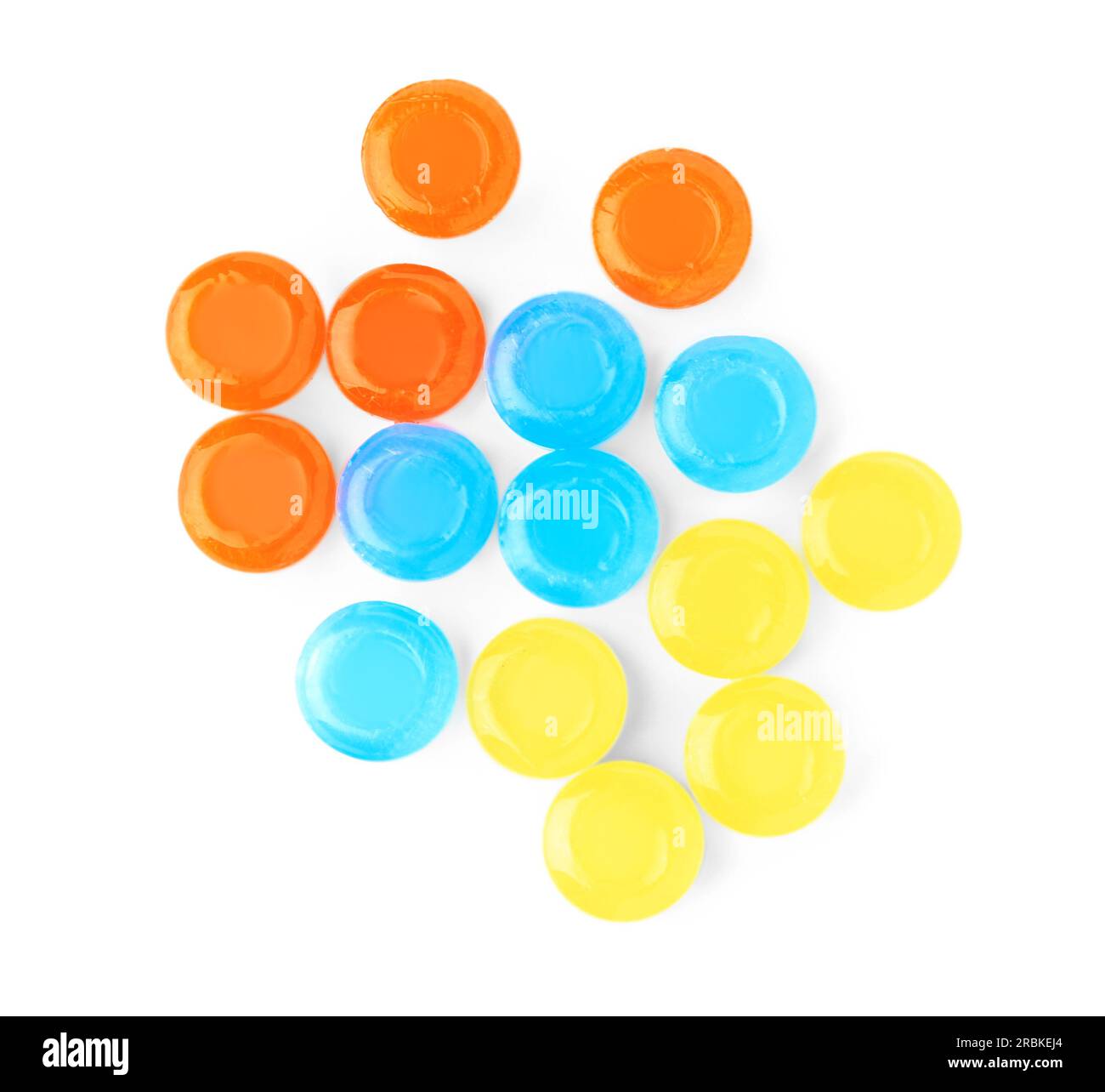 Many different colorful cough drops on white background, top view Stock ...