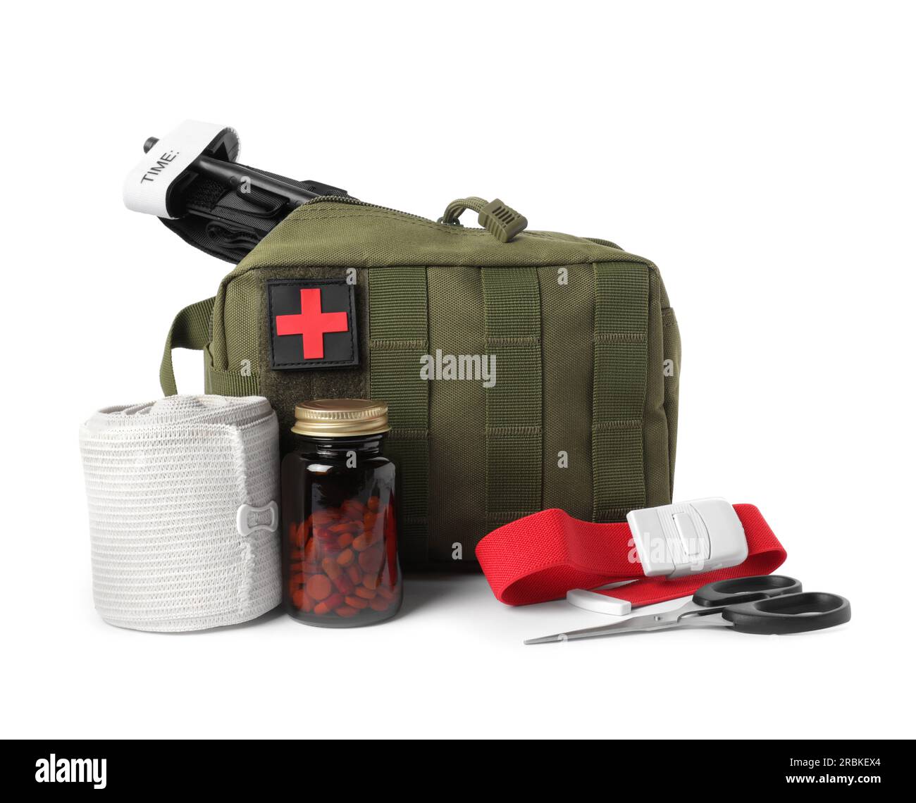 Military first aid kit, tourniquet, pills and tools on white background ...