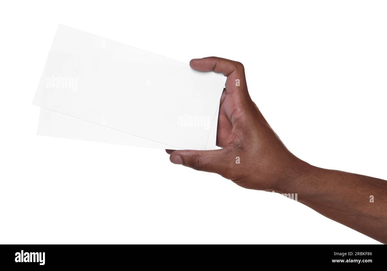 African American man holding flyers on white background, closeup ...