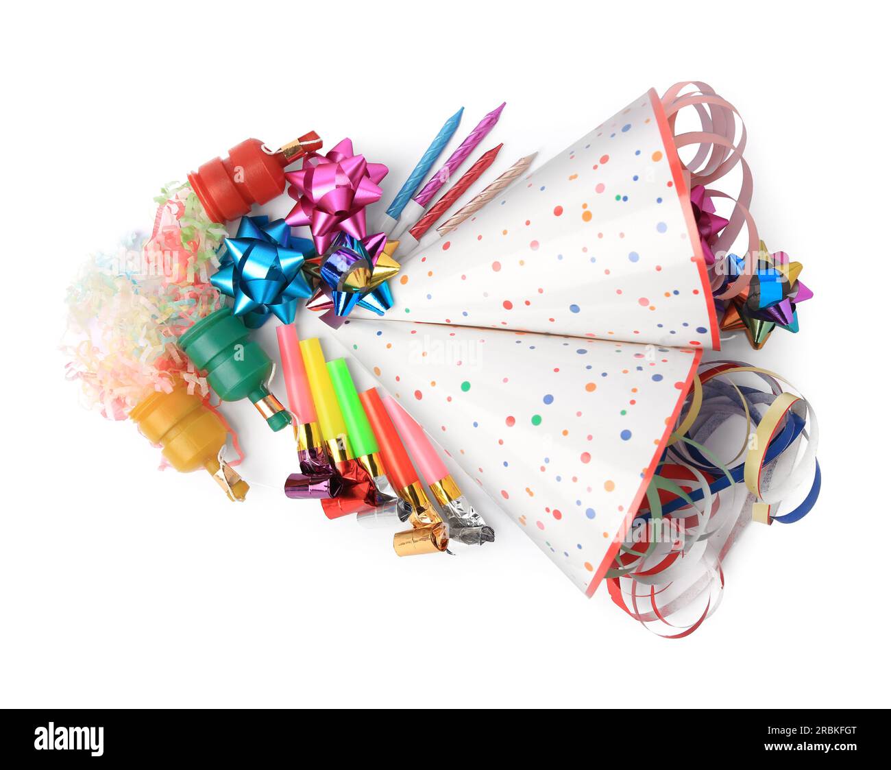 Party crackers and different festive items on white background, top ...