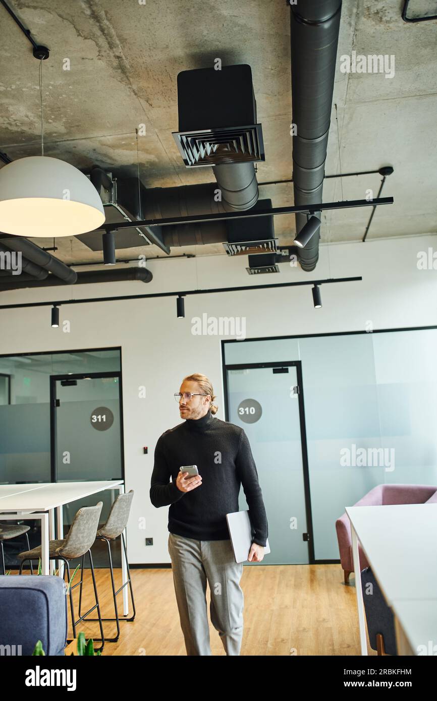 Professional man walking laptop computer hi-res stock photography and ...