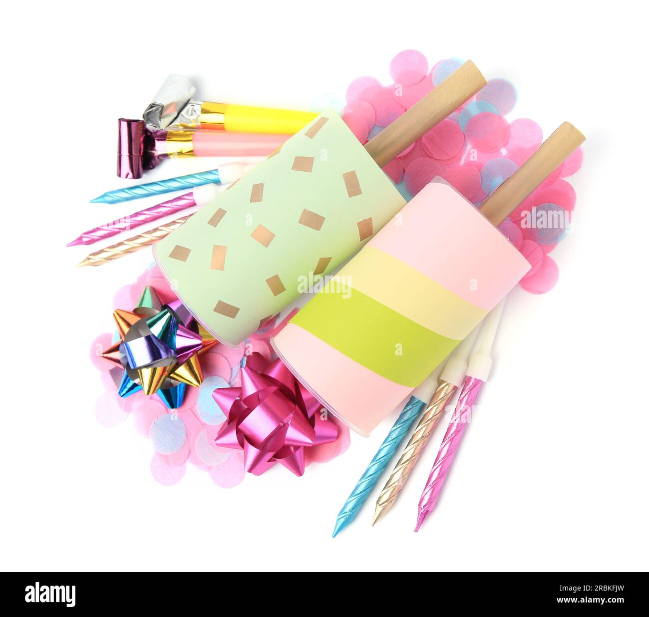 Party crackers and different festive items on white background, top ...