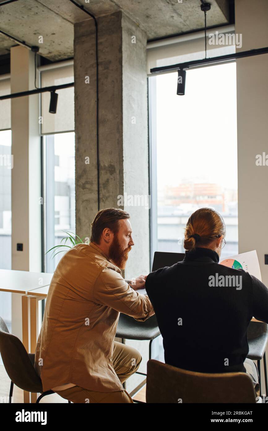 Back view creative team staff hi-res stock photography and images - Alamy