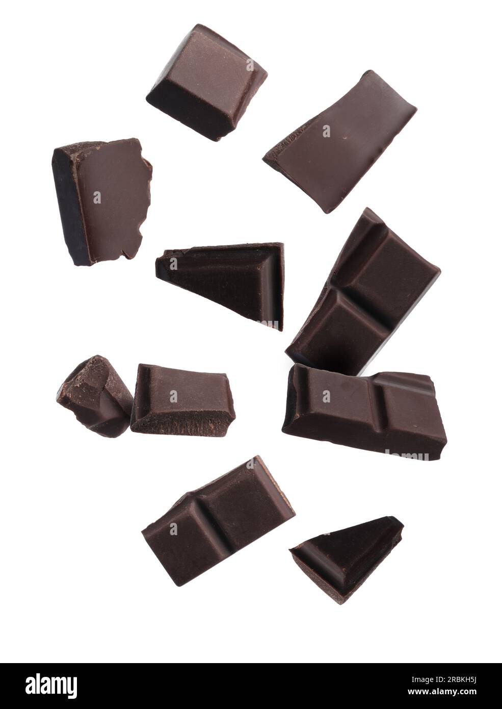 Pieces of chocolate bar falling on white background Stock Photo - Alamy