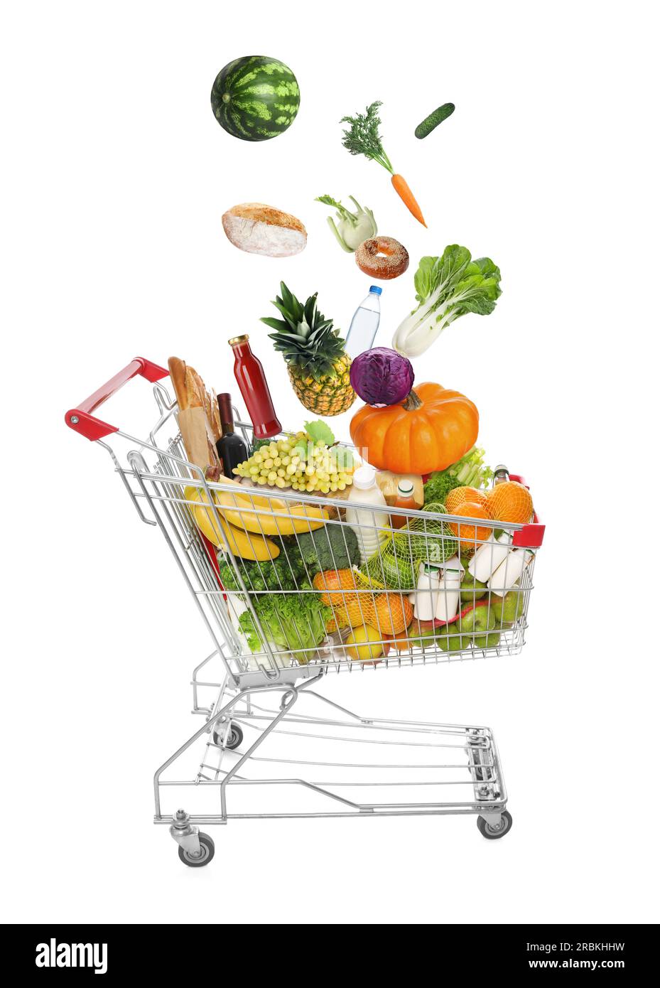 Market assortment. Different products falling into shopping cart on ...