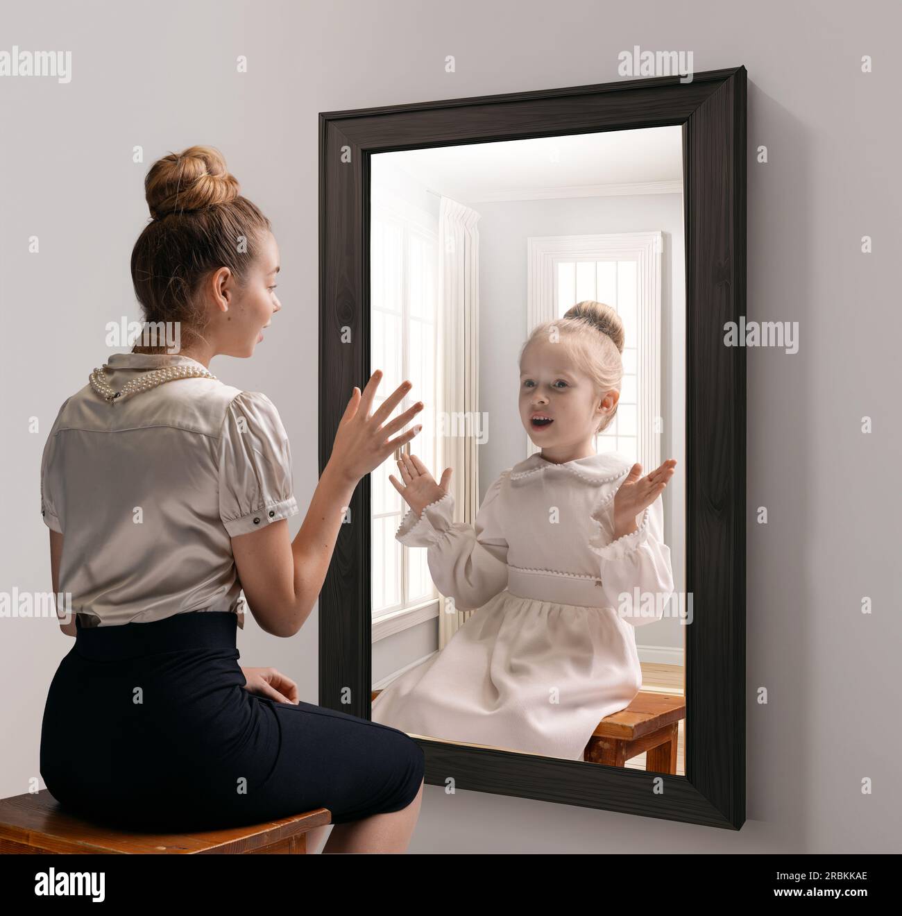 Creative conceptual collage. Excited young girl looking in mirror and ... Creative conceptual collage. Excited young girl looking in mirror and ...