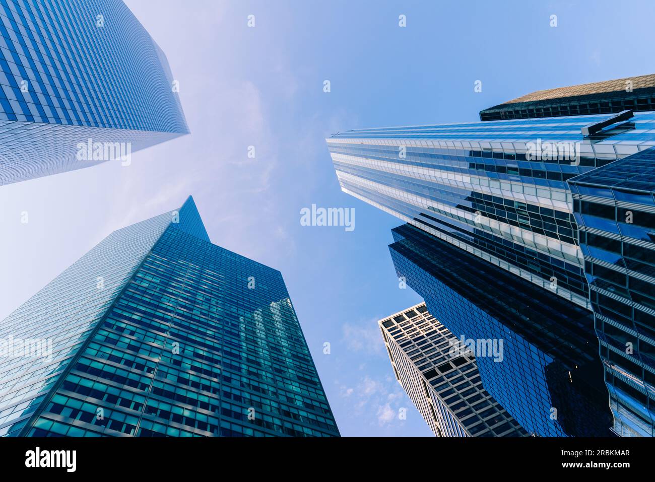 3 Buildings in Manhattan looking up Stock Photo - Alamy