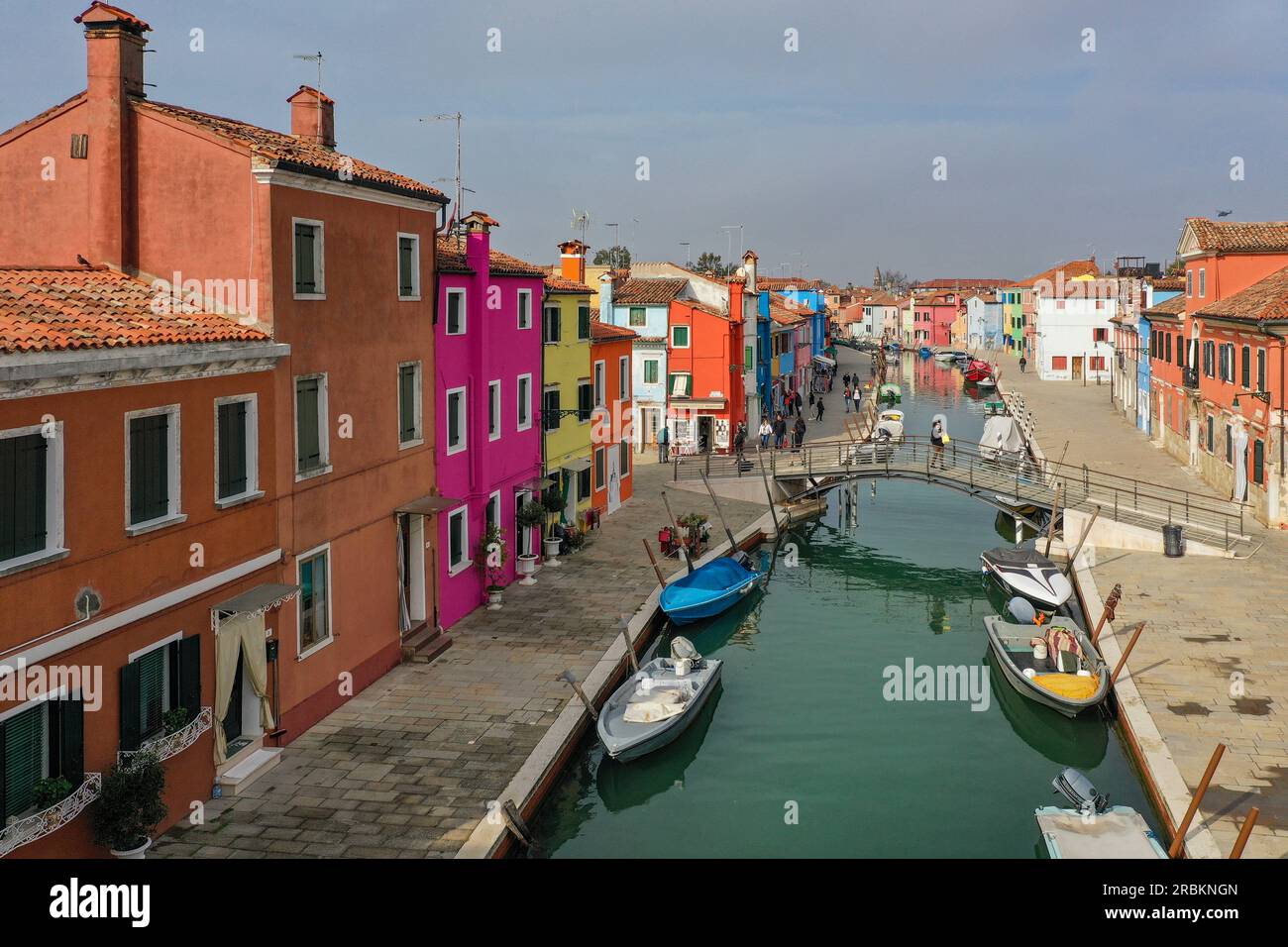 Aerial view of a canal in Burano with colorful houses, Burano, Venice ...