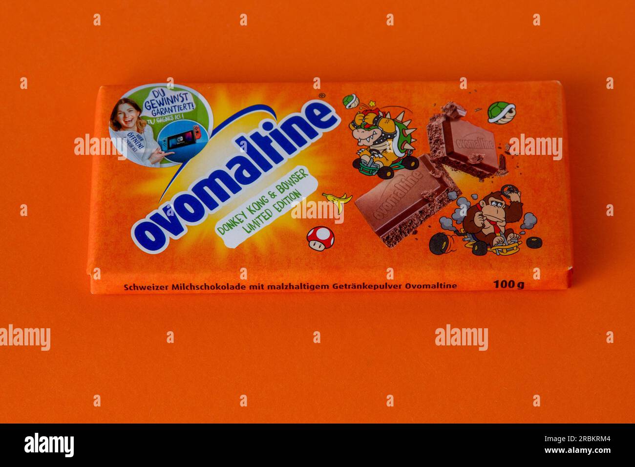 Swiss chocolate from Ovomaltine. Tiles in orange packaging. Children's ...