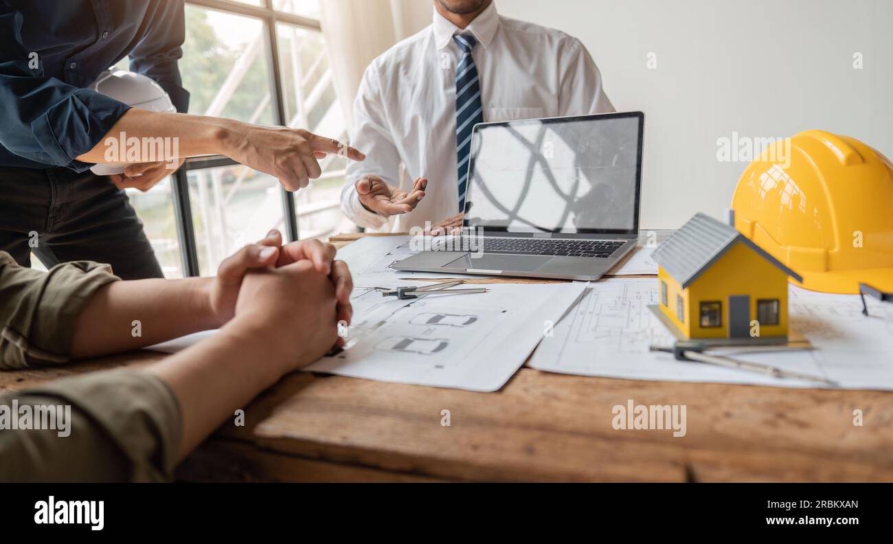 engineer team working in office with blueprints, inspection in ...