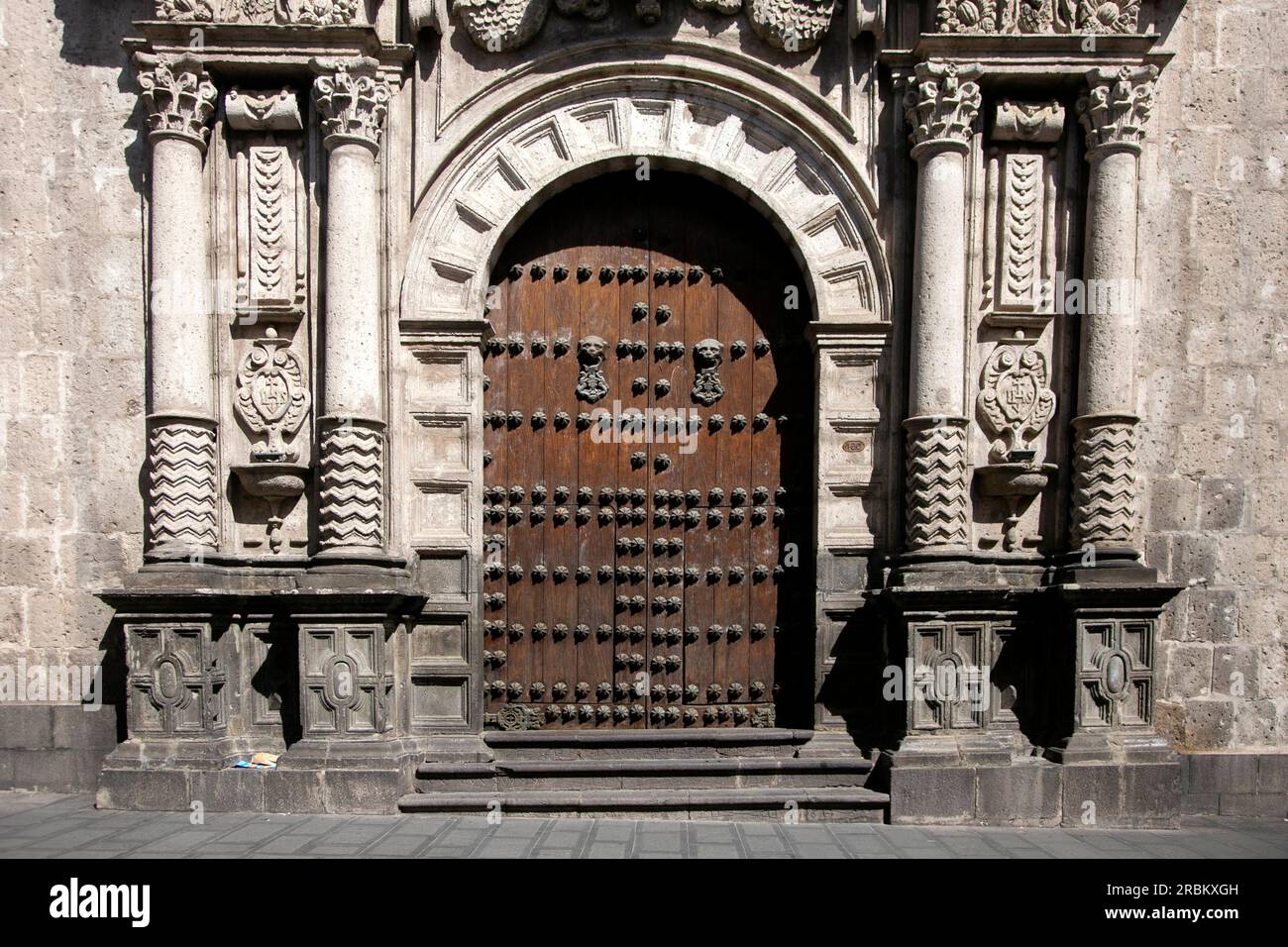 White walls and doors of the old streets of the city of Arequipa in ...
