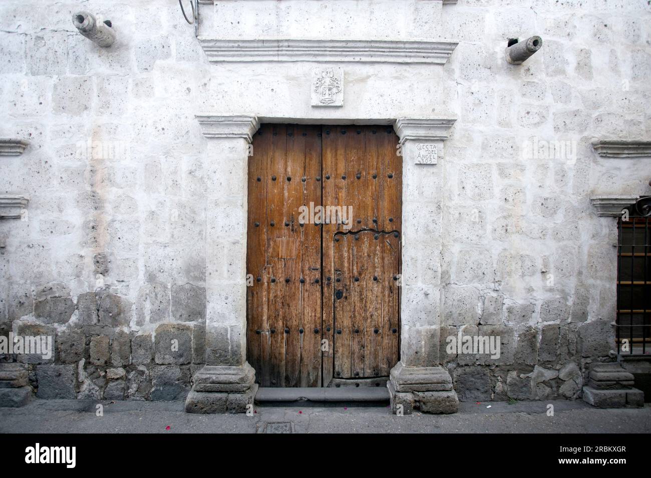 White walls and doors of the old streets of the city of Arequipa in ...