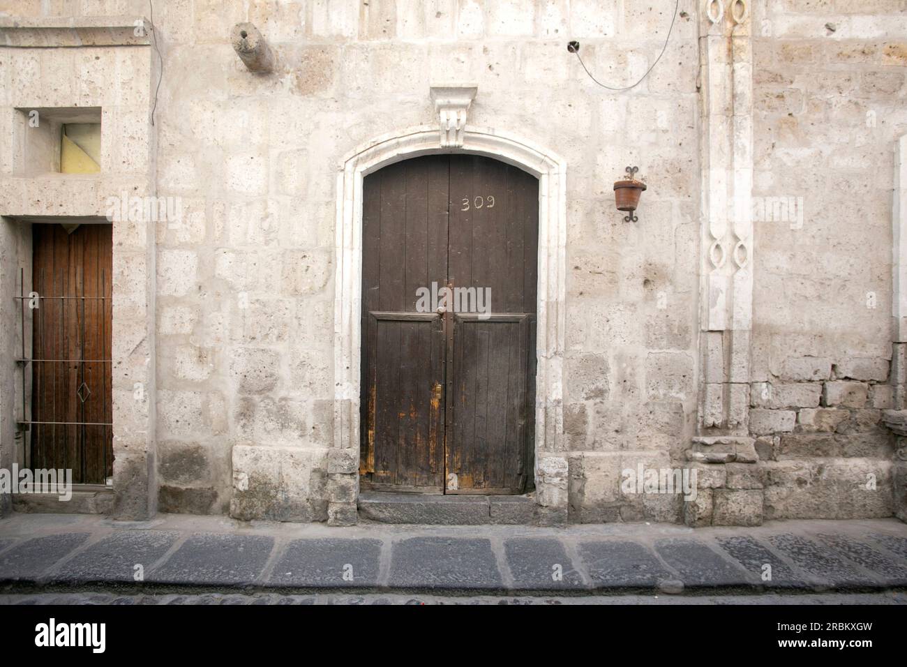 White walls and doors of the old streets of the city of Arequipa in ...