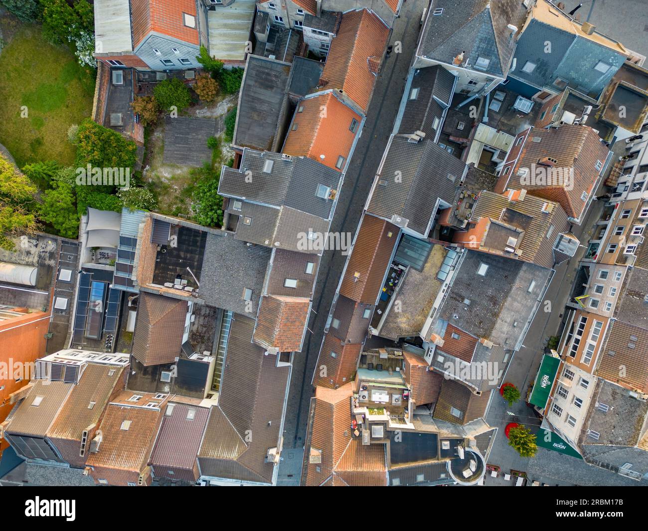 Aerial top view of residential area houses roofs and streets from above ...