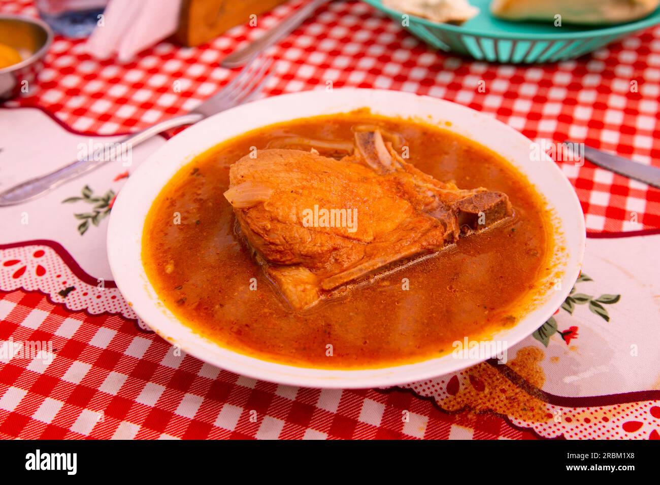 The Adobo de Chancho arequipeño consists of a marinated pork meat dish ...