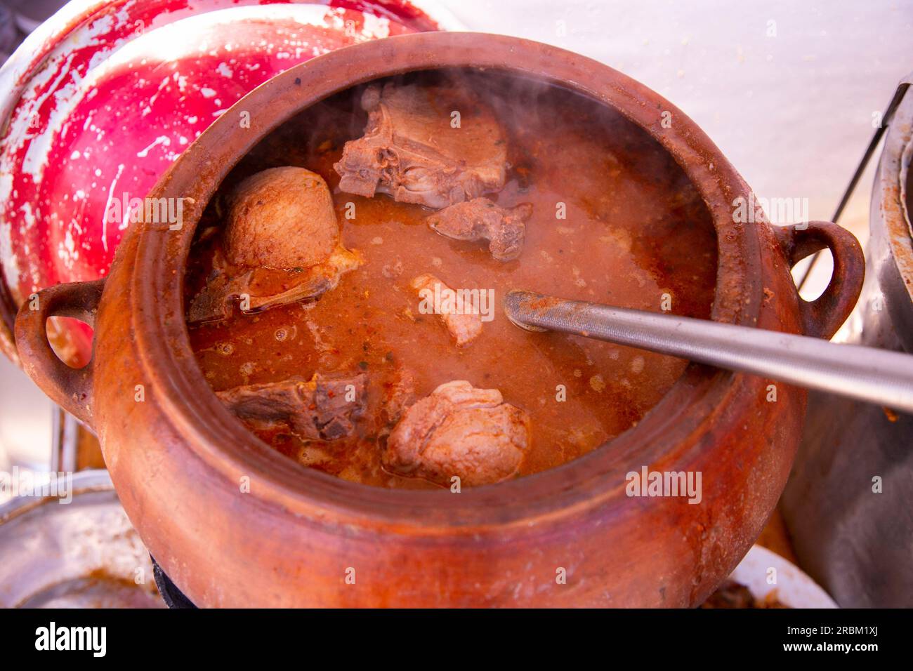 The Adobo de Chancho arequipeño consists of a marinated pork meat dish ...