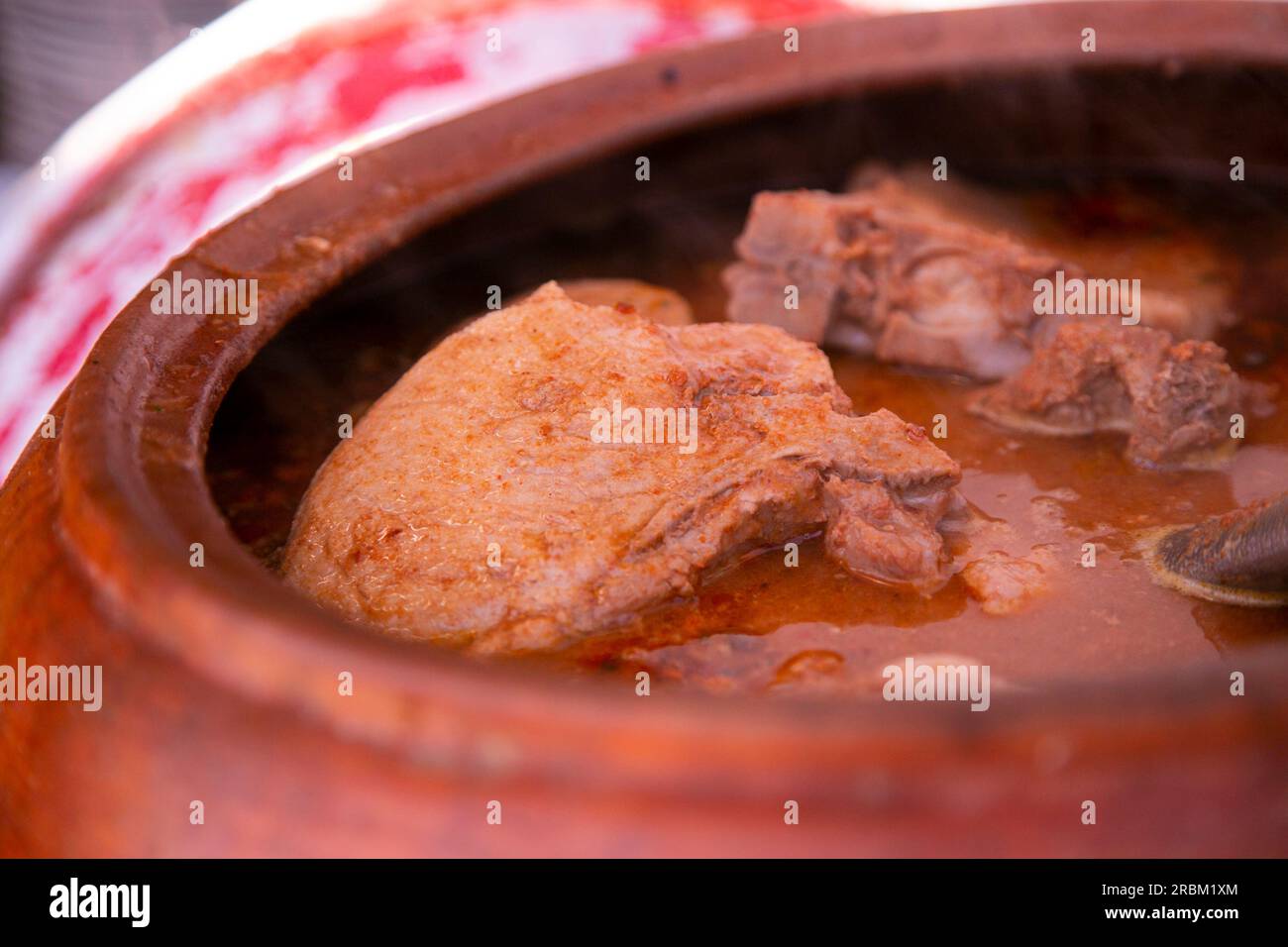 The Adobo de Chancho arequipeño consists of a marinated pork meat dish ...