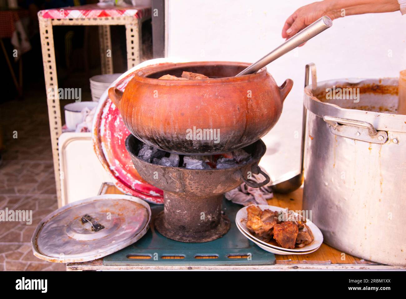 The Adobo de Chancho arequipeño consists of a marinated pork meat dish ...