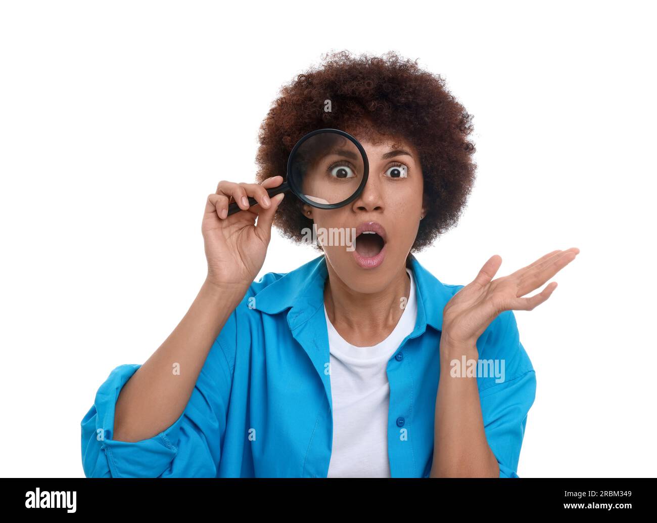 Surprised woman looking through magnifier glass on white background ...
