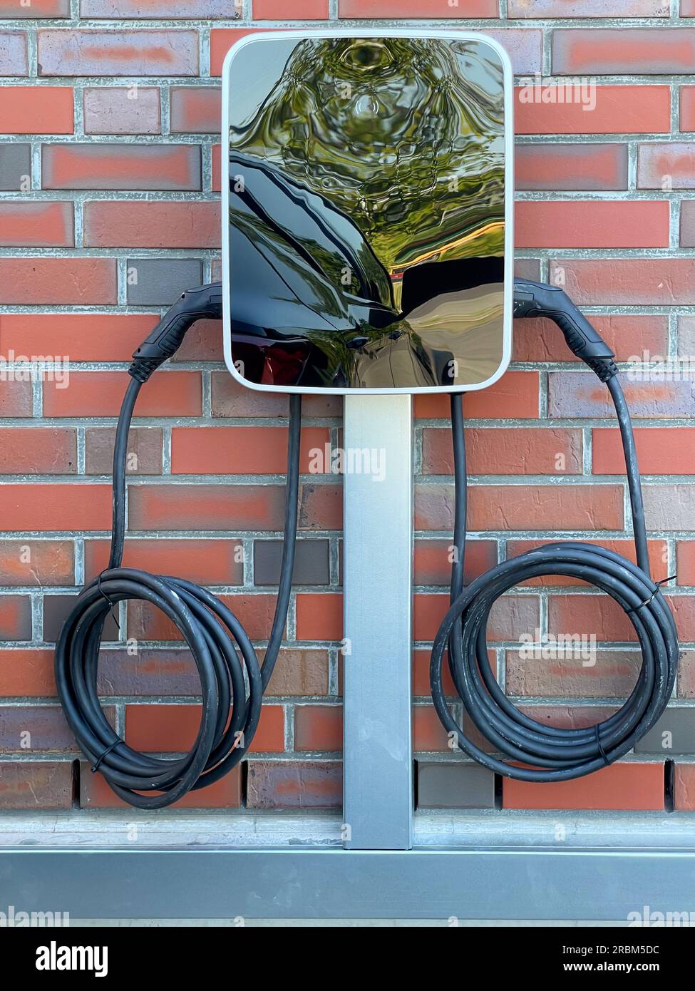 Charging station for cars on the wall of the building. Charging station ...