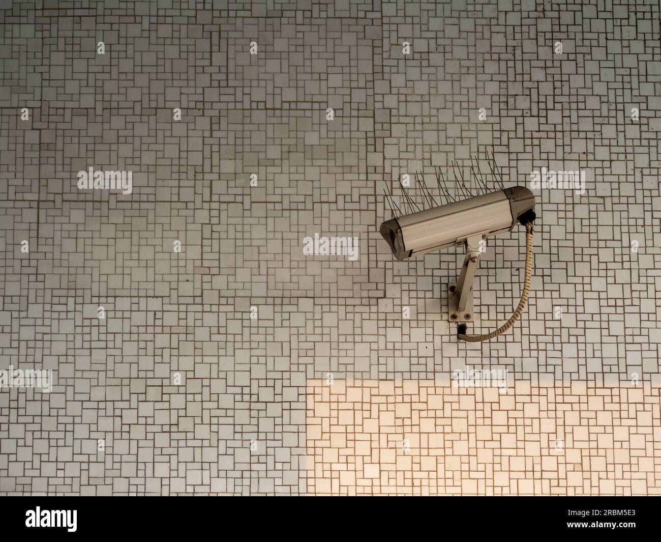 Surveillance camera on the facade of the building. Video surveillance ...