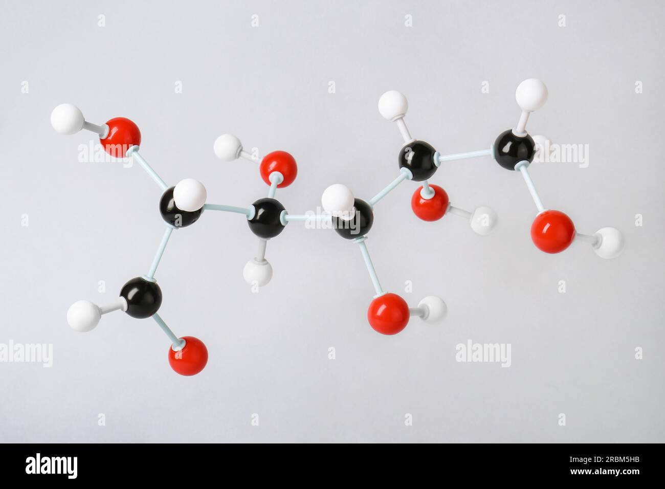 Molecule of glucose on light grey background. Chemical model Stock ...