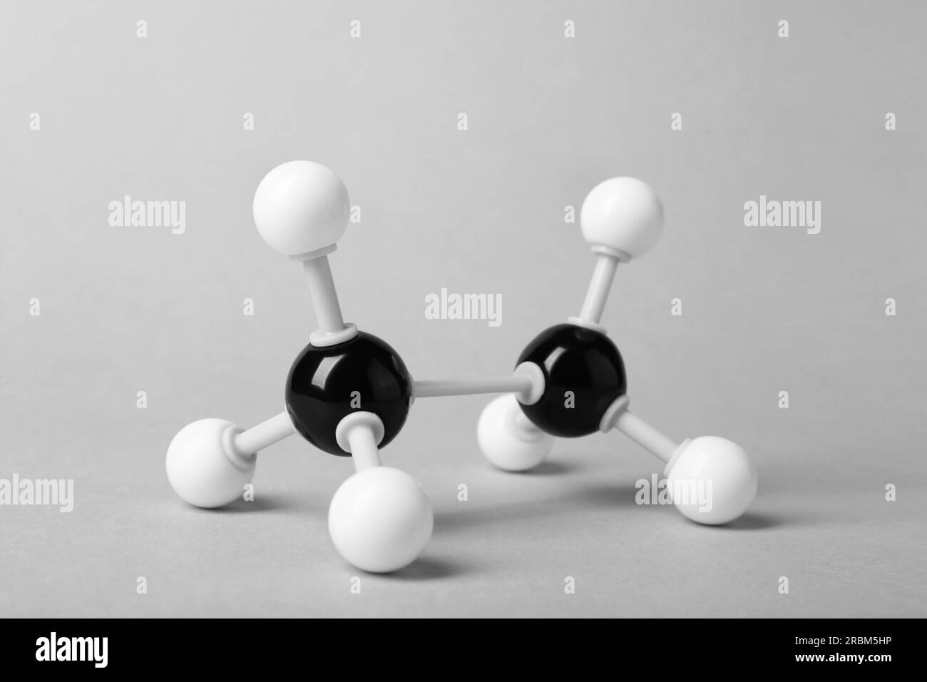 Molecule of alcohol on light grey background. Chemical model Stock ...