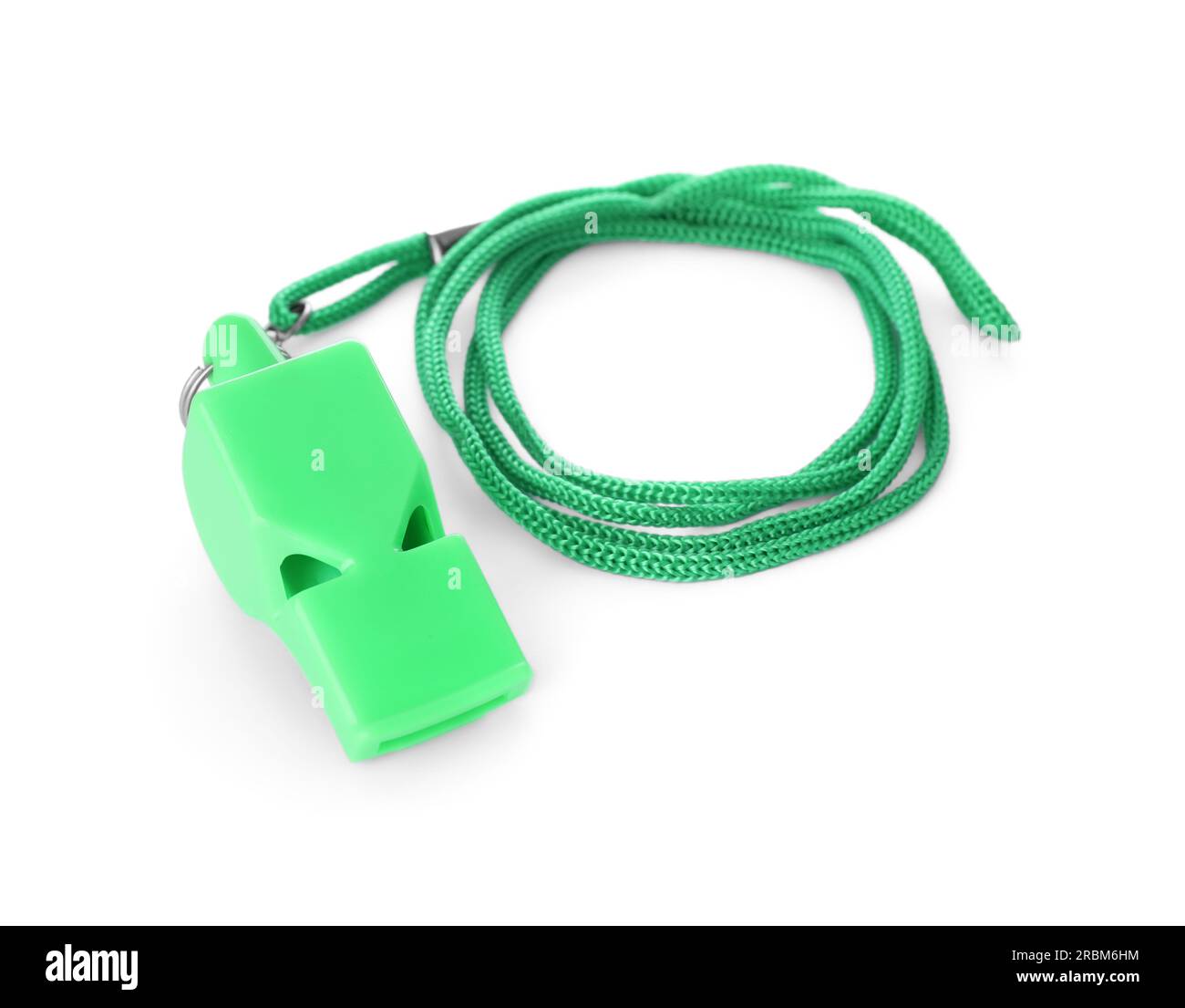 One green plastic whistle with cord isolated on white Stock Photo - Alamy