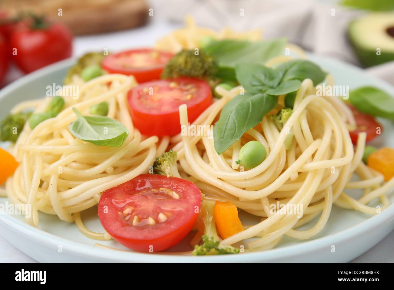 Plate of delicious pasta primavera, closeup view Stock Photo - Alamy