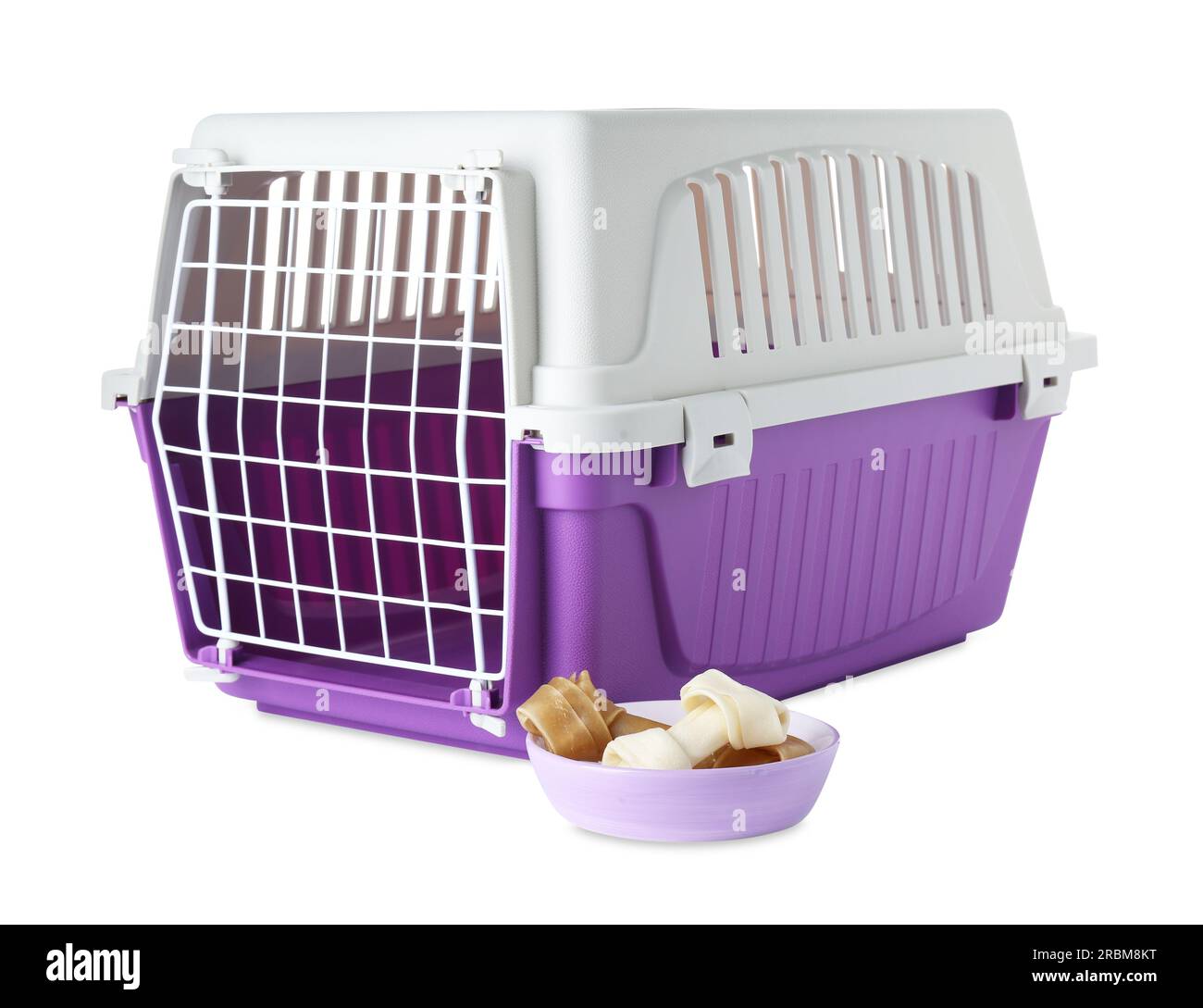 Violet pet carrier and bowl with chewing bones isolated on white Stock ...