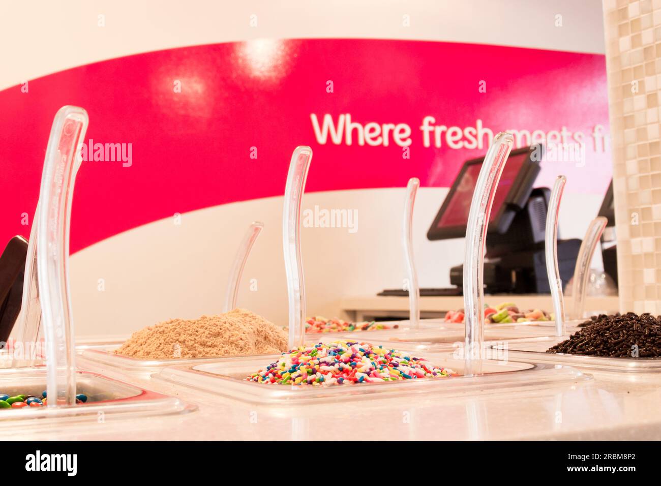 Frozen yogurt topping Stock Photo - Alamy