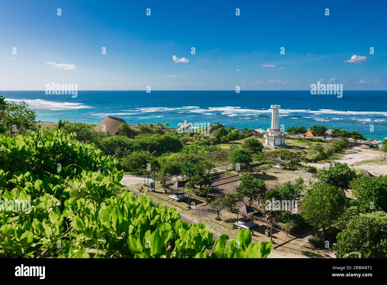 Pandawa beach in Bali island. Scenic coastline with lighthouse and blue ...