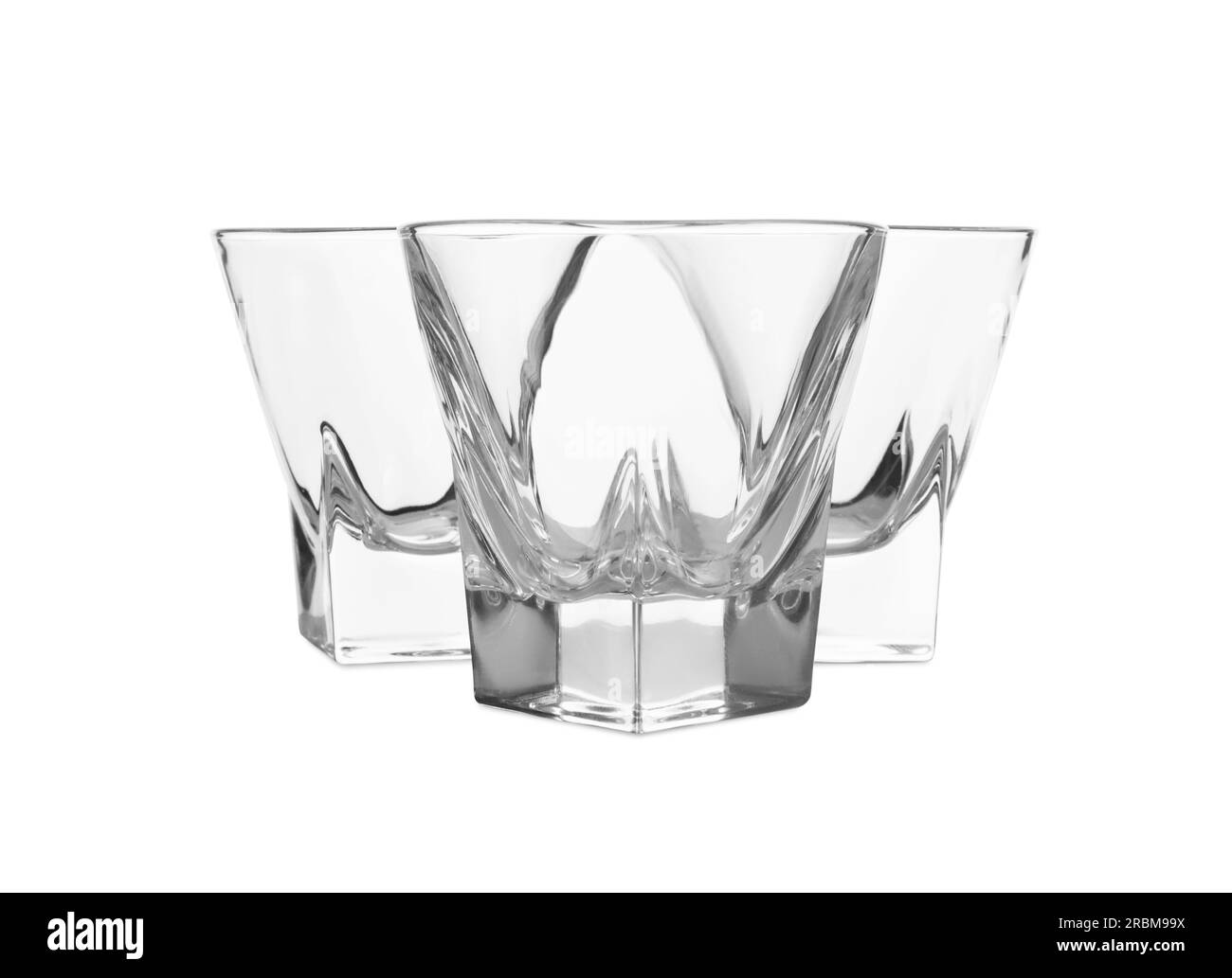 Elegant clean empty shot glasses isolated on white Stock Photo - Alamy
