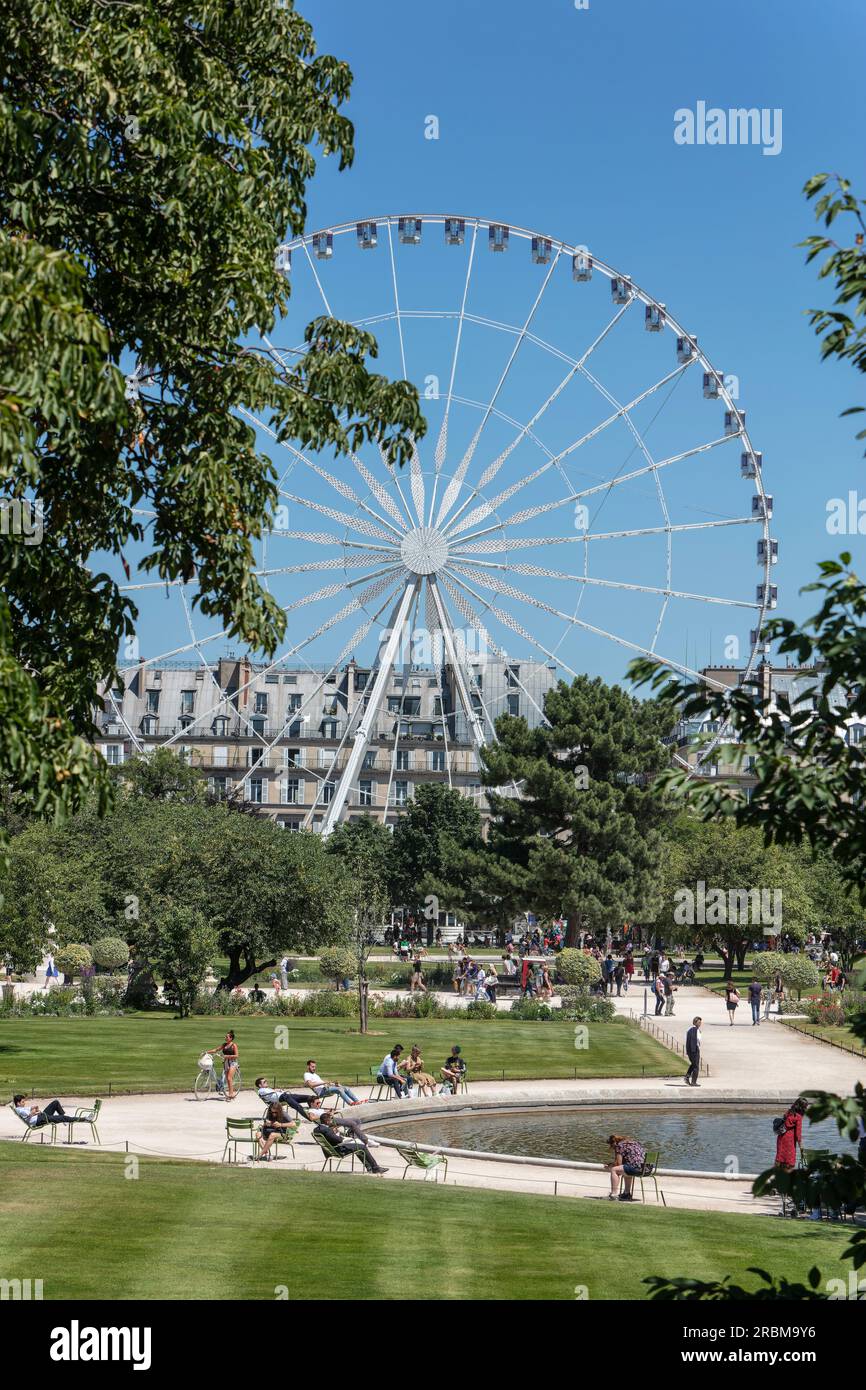 Jardin des Tuileries. Ferris wheel in funfair by 17th century Tuileries ...