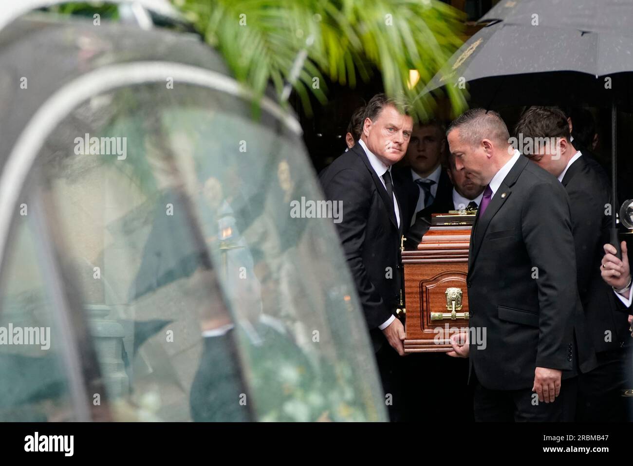 The coffin of 18-year-old Max Wall is carried from his funeral at The ...