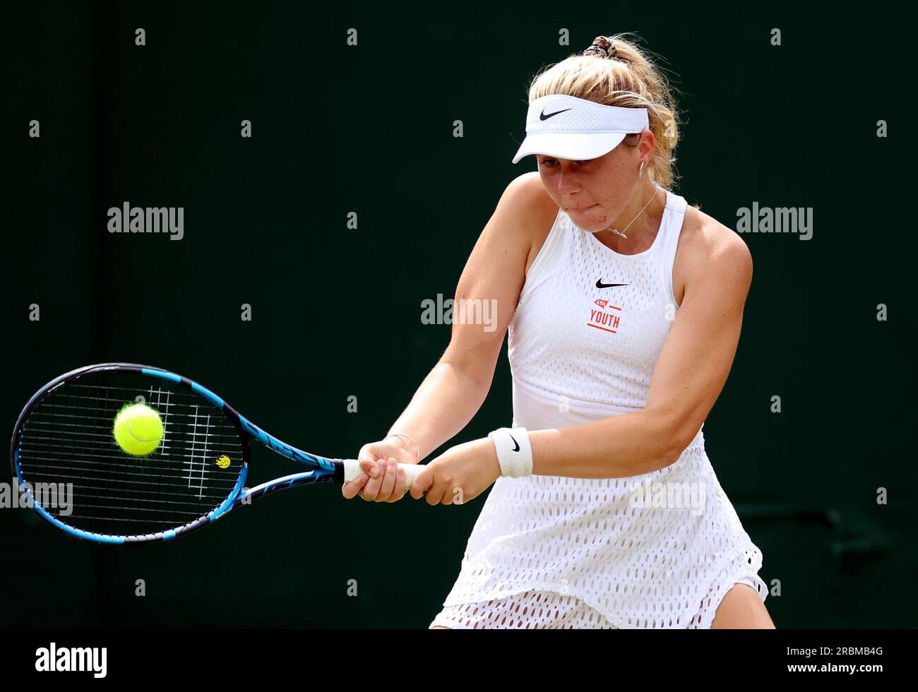 Ella McDonald in action during her girls singles match on day eight of ...