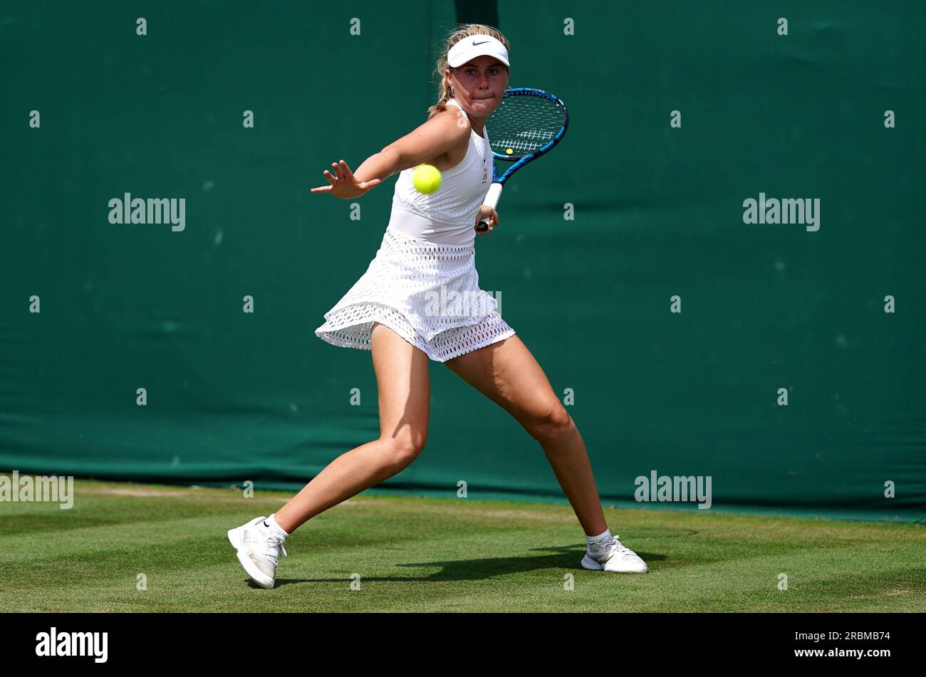 Ella McDonald in action during her girls singles match on day eight of ...
