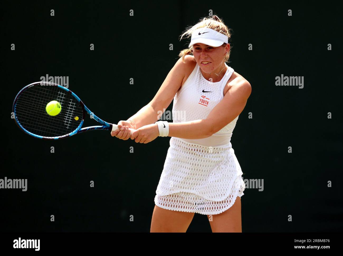 Ella McDonald in action during her girls singles match on day eight of ...