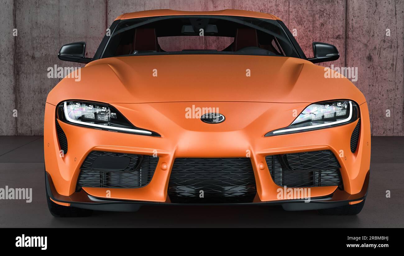 Sporty Toyota Supra against the backdrop of a concrete studio Stock ...
