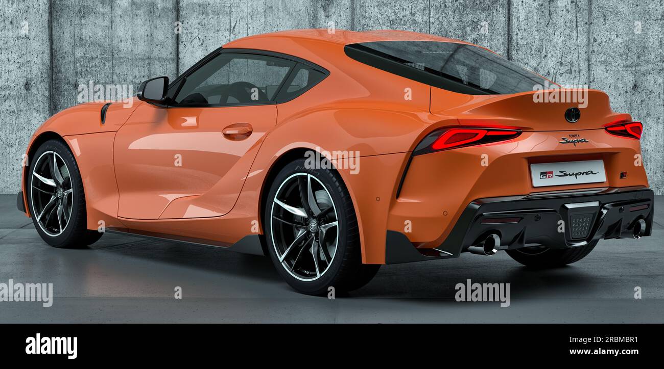 Sporty Toyota Supra against the backdrop of a concrete studio Stock ...